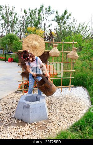 Tangshan City - May 28, 2016: boulder engraving and earth building in ...