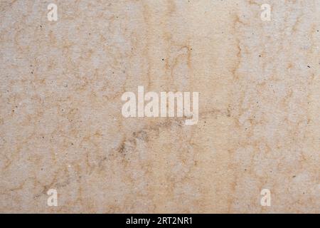 Water stained on brown corrugated packaging material background with ...
