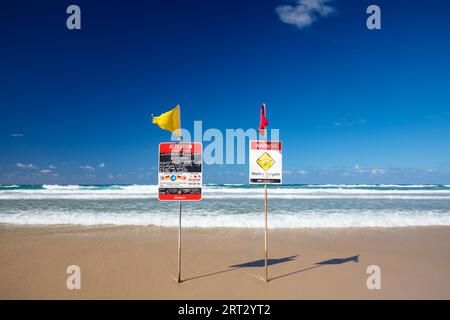 Surf lifesaving flags on a hot sunny day in Broadbeach, Gold Coast ...