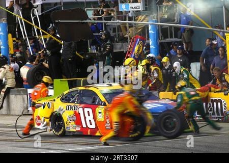 Kyle Busch makes a pit stop during the NASCAR Daytona 500 auto race at ...