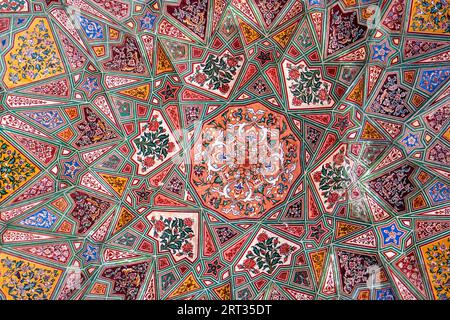 Artistic historical ceiling with colorful decorations at Masjid Wazir ...