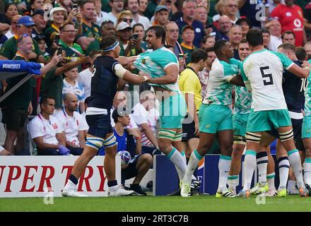 Scotland's Jamie Ritchie argues with South Africa's Damian Willemse ...