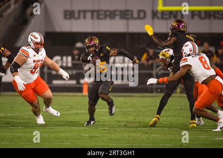 Arizona State running back DeCarlos Brooks, center, leaps over ...