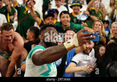 South Africa's Siya Kolisi takes a selfie with fans following the Rugby ...