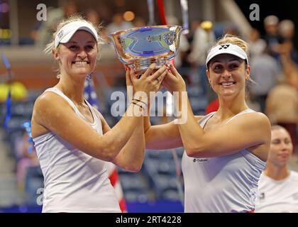 Erin Routliffe of New Zealand and Gabriela Dabrowski of Canada pose with the women's doubles ...