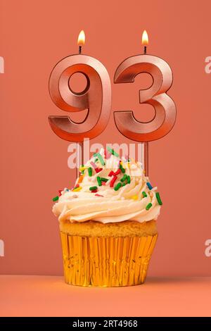 birthday cake with number 93 - cupcake on orange background with ...