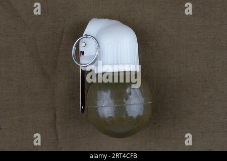 Soviet hand grenade RGN on khaki canvas background Stock Photo - Alamy