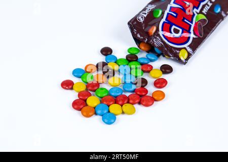 Pile of Rainbow Colored Small Chewy Square Candies Isolated on a White ...