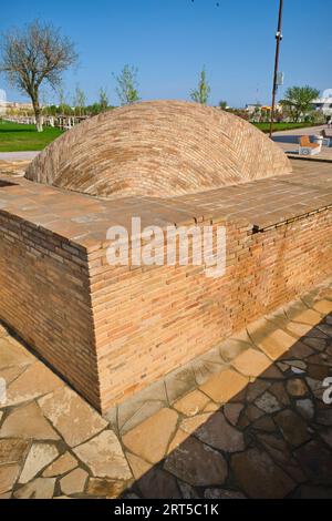 Exterior view of the small, tiny, partially underground, domed site. At ...