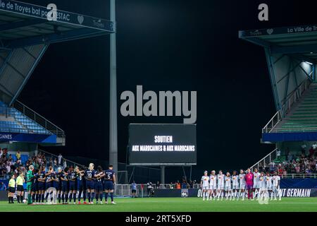 Lyon players stand during a minute of silence for Pope Francis before ...