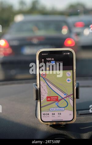 Mobile phone shows traffic jam on the motorway Stock Photo - Alamy