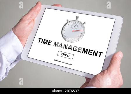Tablet screen displaying a time management concept Stock Photo - Alamy