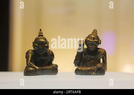 Ancient Chinese copper figures, unearthed cultural relics Stock Photo ...