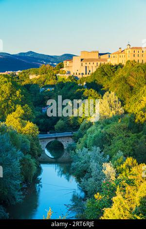 Scenic view of a river featuring lush vegetation. Arga River, Pamplona ...