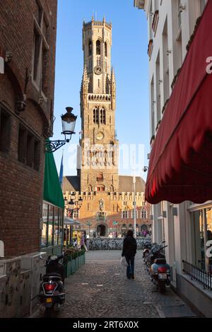 Streets of Brugge with people sightseeing Stock Photo - Alamy