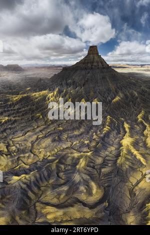 Spectacular aerial view of Factory Butte at sunset with vivid sky ...