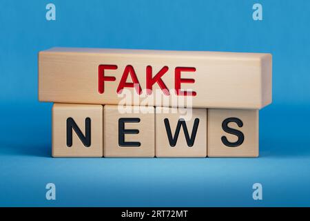 Fake - word on wooden blocks - 3D illustration Stock Photo - Alamy