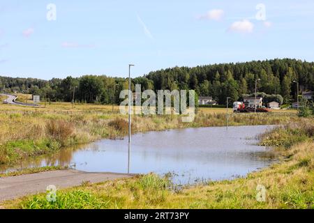 Flooded Mahtinaisentie pedestrian and cycle underpass due to heavy ...