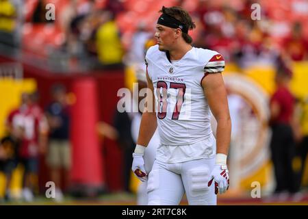 Washington Commanders tight end John Bates (87) blocks during an NFL ...