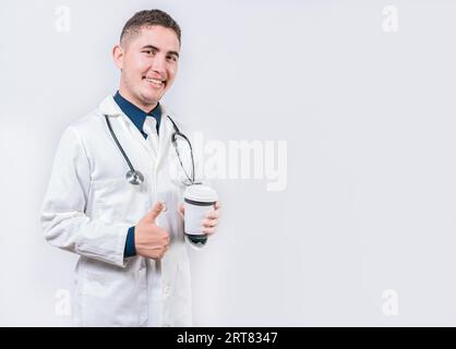 smiling doctor with a takeaway coffee. isolated on a white Stock Photo ...