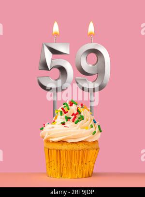 Birthday card number 59 - Cupcake with balloons Stock Photo - Alamy