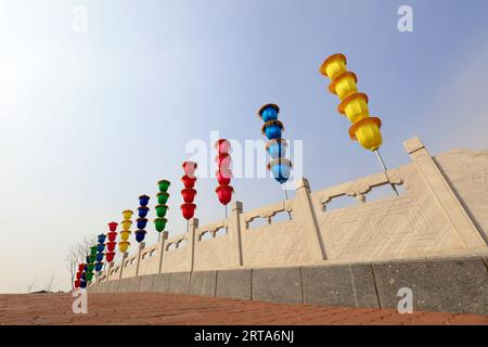 Stone bridge railing and lantern Stock Photo - Alamy