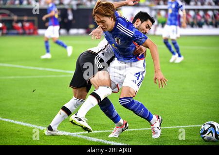 Kō Itakura #4 of Japan national team runs whit the ball during the FIFA ...