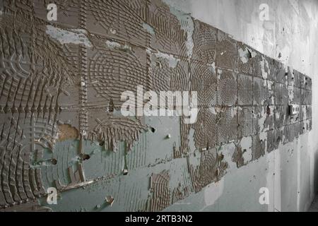 removed tiles from dry wall during kitchen renovation Stock Photo - Alamy