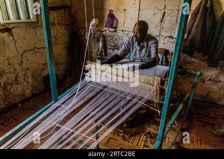 DORZE, ETHIOPIA - JANUARY 30, 2020: Dorze man is showing their ...