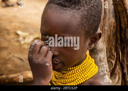 KORCHO, ETHIOPIA - FEBRUARY 4, 2020: Child of Karo tribe in Korcho ...