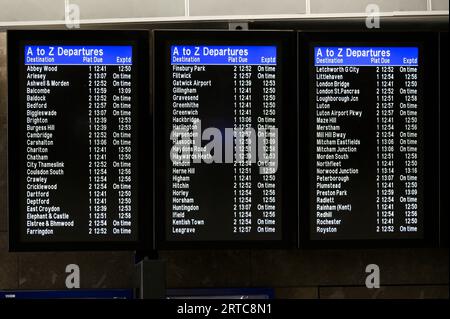 Digital information screens on a platform at London Blackfriars Railway ...