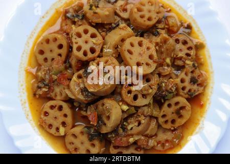 Tasty Lotus stem curry, a side dish made with lotus stem with gravy ...