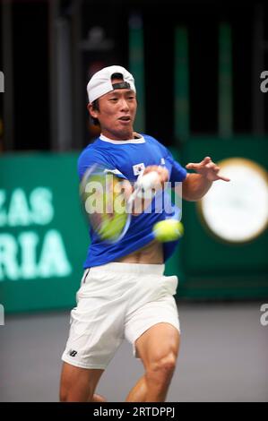 Hong Seong Chan (KOR) in action during the DAVIS CUP by Rakuten at The ...