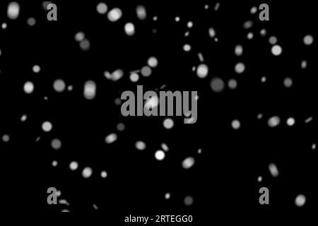Snowflakes falling down on black background, heavy snow flakes isolated ...