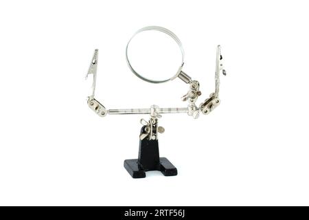 Fully adjustable helping hand magnifier isolated on white background ...