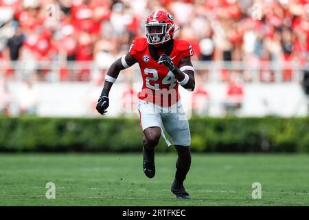 Georgia defensive back Malaki Starks reacts before on a hat after being ...