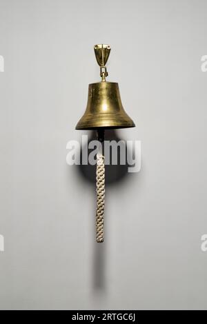 A vertical shot of a hanging bell Stock Photo - Alamy