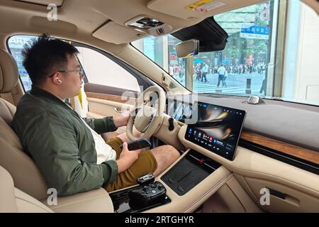 SHANGHAI, CHINA - SEPTEMBER 13, 2023 - Customers experience the newly ...