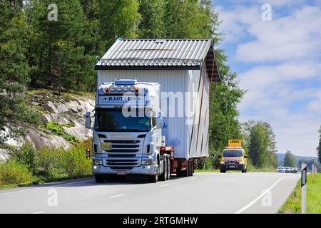 Oversize load transport of prefabricated cabin by truck semi trailer ...