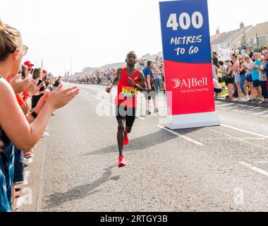 Elite runner Bashir Abdi running in the 2021 Great North Run, GNR40 around Newcastle city center ...