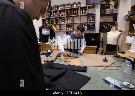Master Cutter at Dege & Skinner, family-owned tailoring house, Savile ...