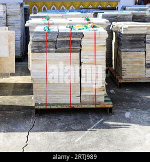 Pile or stack of marble slabs, marble tile used as materials for ...