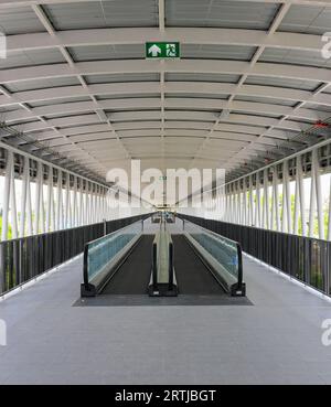 Pedestrian pathway or corridor or hallway with automatic walkway or ...