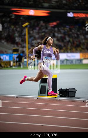 Yemi Mary John participating in the 4X400 meters relay at the World ...