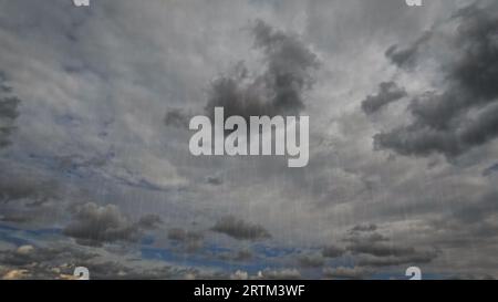 rainfall on sky with clouds - pretty weather bg - photo of nature Stock ...