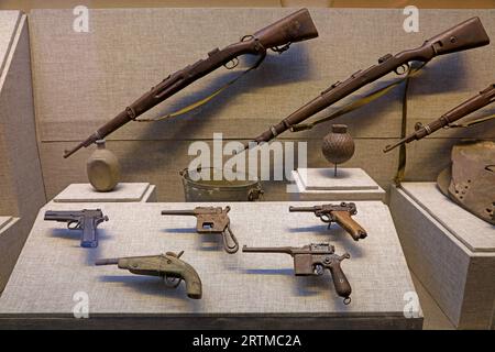 Weapons and equipment in an exhibition hall Stock Photo - Alamy