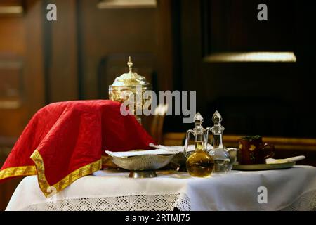 Catholic liturgical objects displayed over marble table at church ...