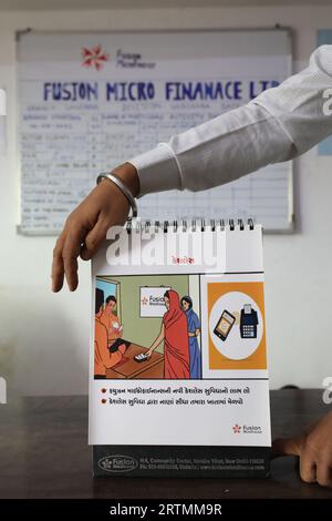 Microfinance institution flip charts in Sagbara, Gujarat, India Stock ...