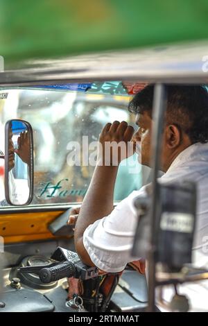 Autorickshaw driver in Mumbai, India Stock Photo - Alamy