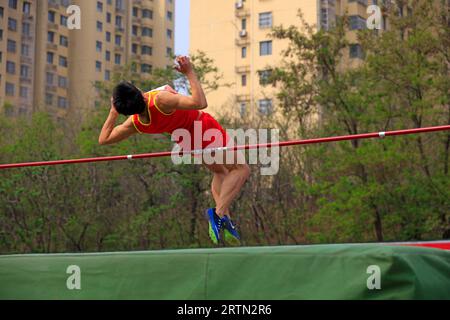 High jumpers at the scene of the game Stock Photo - Alamy
